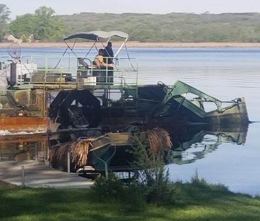 Hard at it this morning! - Phantom Lakes Management District